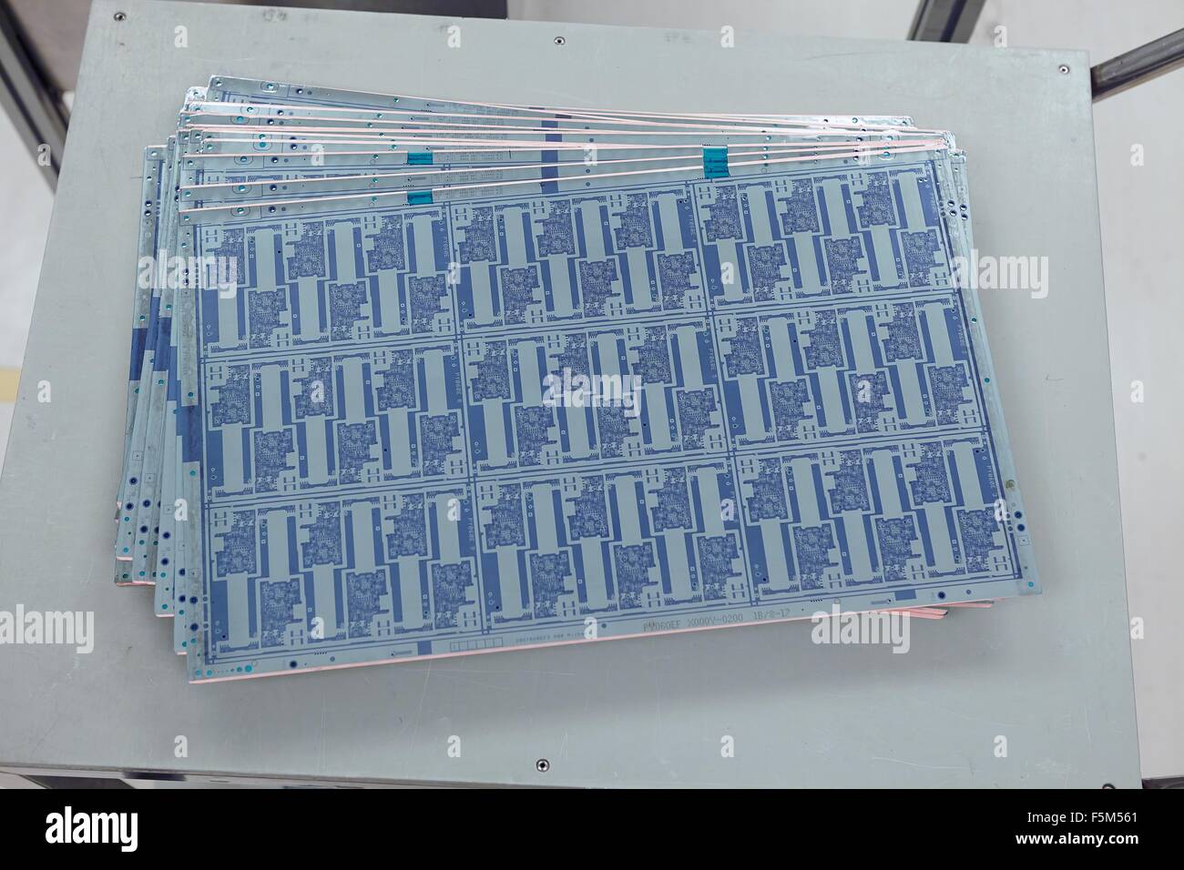 Stack of flex circuits in flexible electronics factory Stock Photo - Alamy