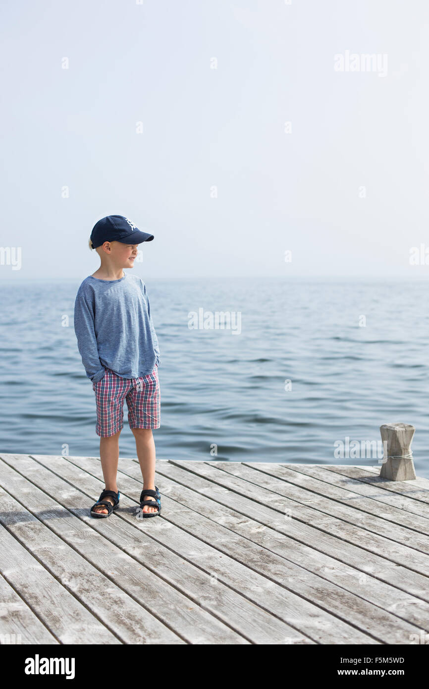Boy standing with hands in pocket hi-res stock photography and images ...