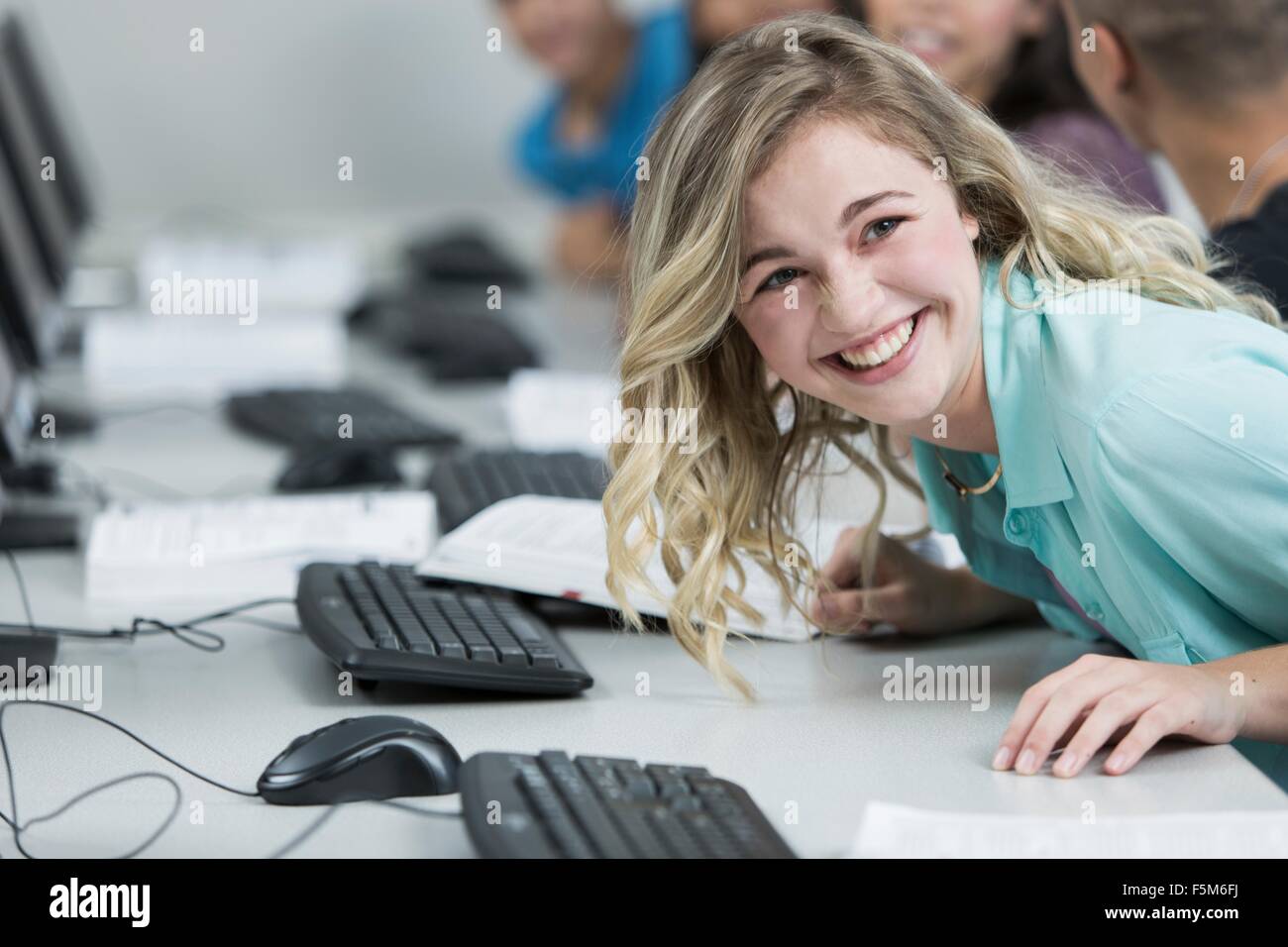 Row of high school students laughing in class Stock Photo - Alamy