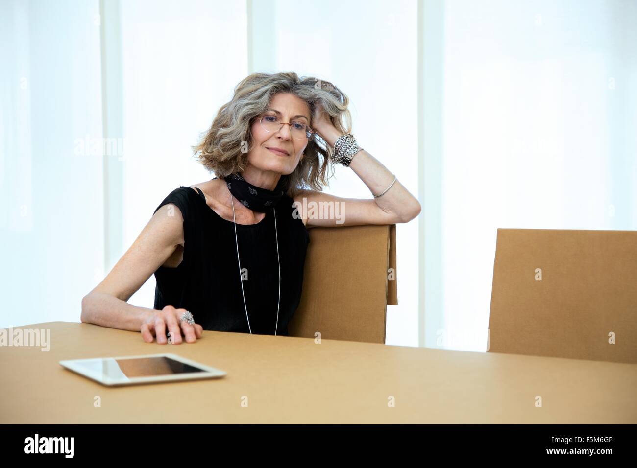 Senior woman designer using hi-res stock photography and images - Alamy