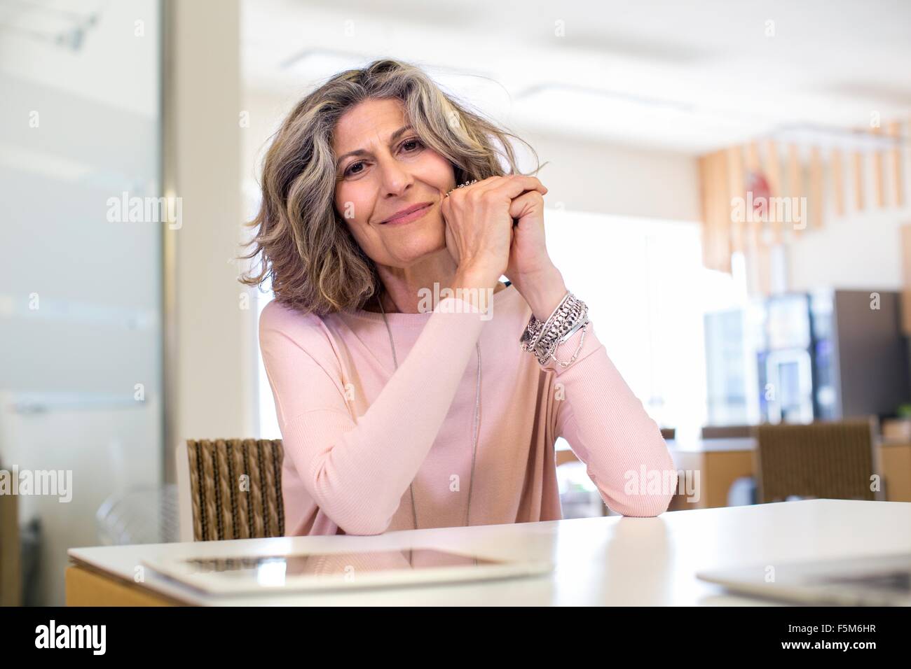 Portrait of senior female designer in office Stock Photo - Alamy