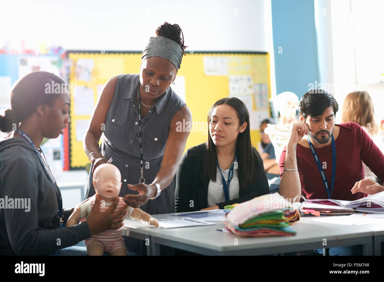 Lecturer speaking to college students in Childcare class Stock Photo ... Lecturer speaking to college students in Childcare class Stock Photo ...