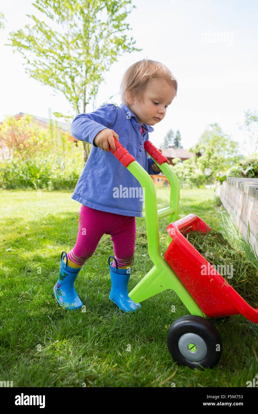 Wheelbarrow garden hi-res stock photography and images - Alamy