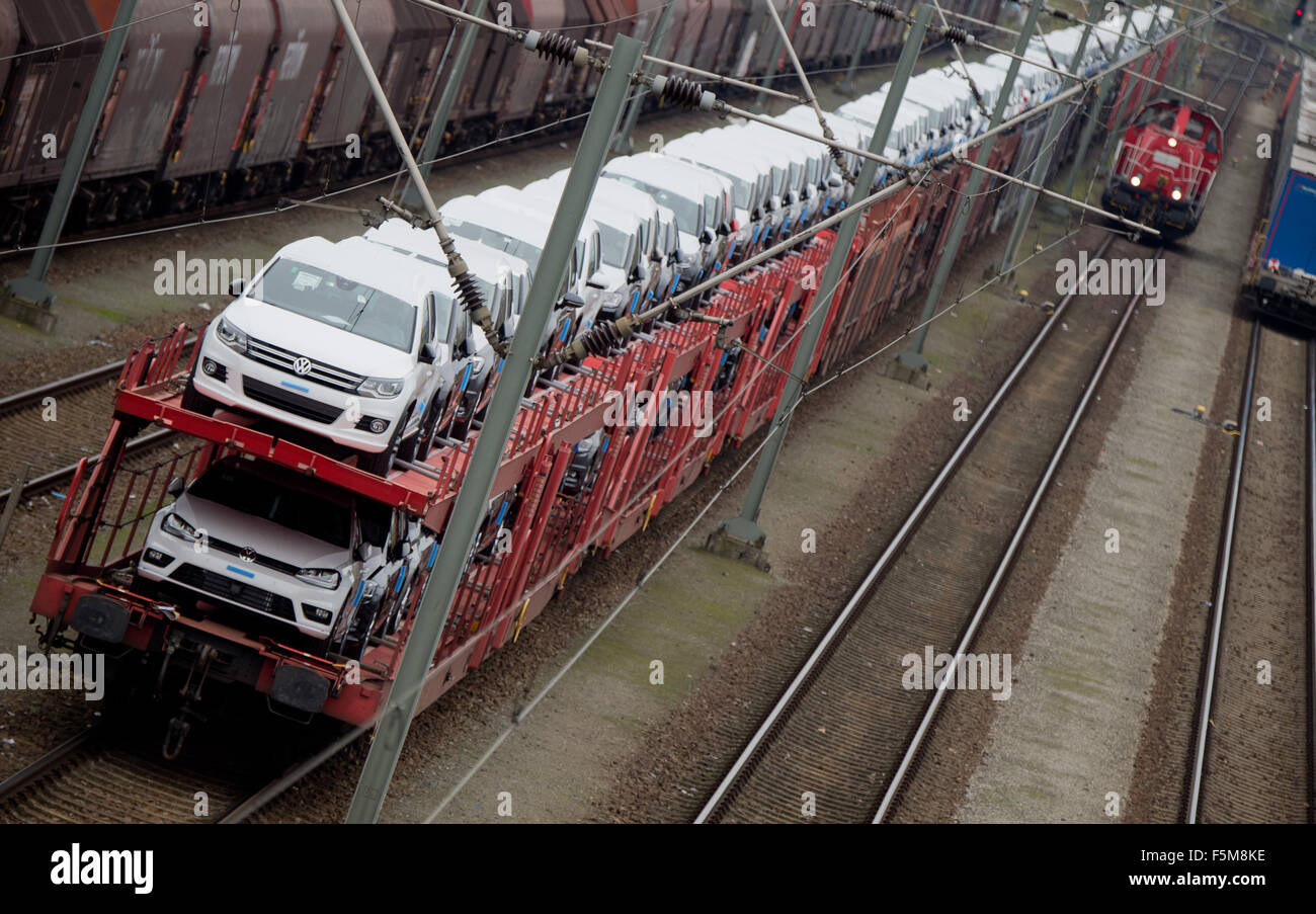 A freight train transports new cars of carmaker Volkswagen (VW) in ...