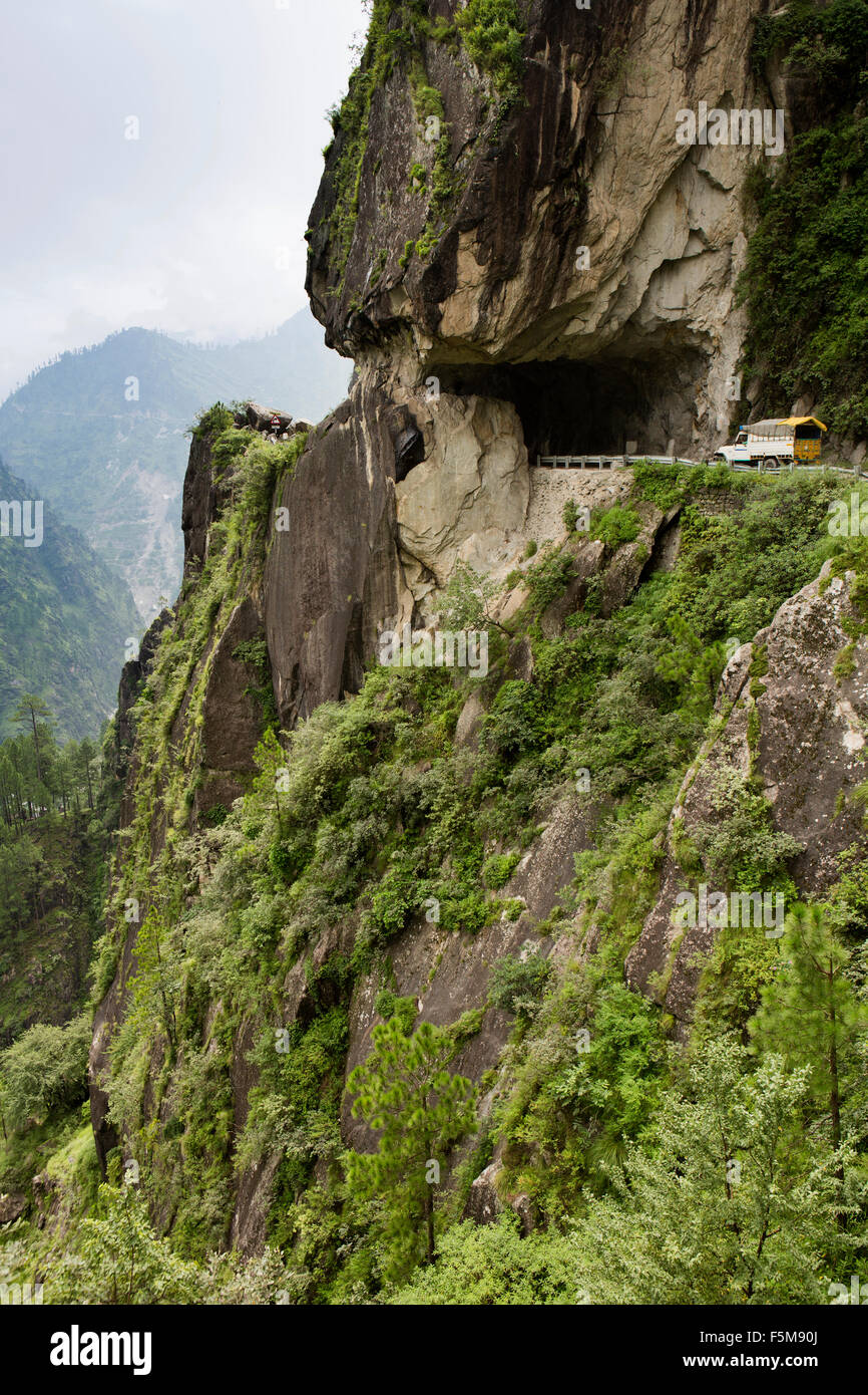 India, Himachal Pradesh, Kinnaur, road tunnel cut in rock overhang of ...