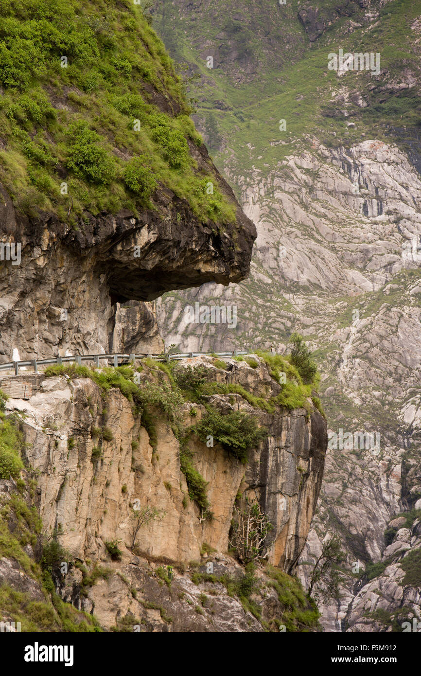 India, Himachal Pradesh, Kinnaur, road cut in sheer cliff face of steep ...
