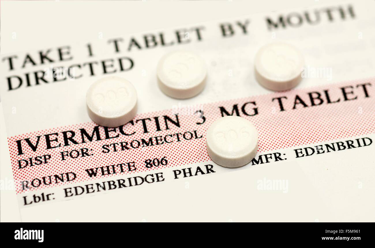 Ivermectin pills (a broad-spectrum antiparasitic agent) on top of ...