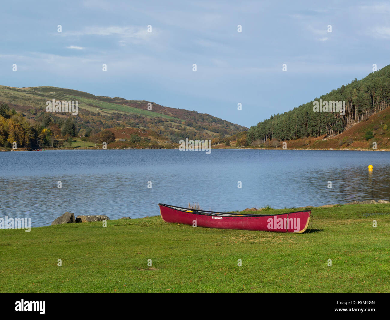 Red Canoe Llyn Geirionydd Conwy North Wales on lovely autumn day where ...