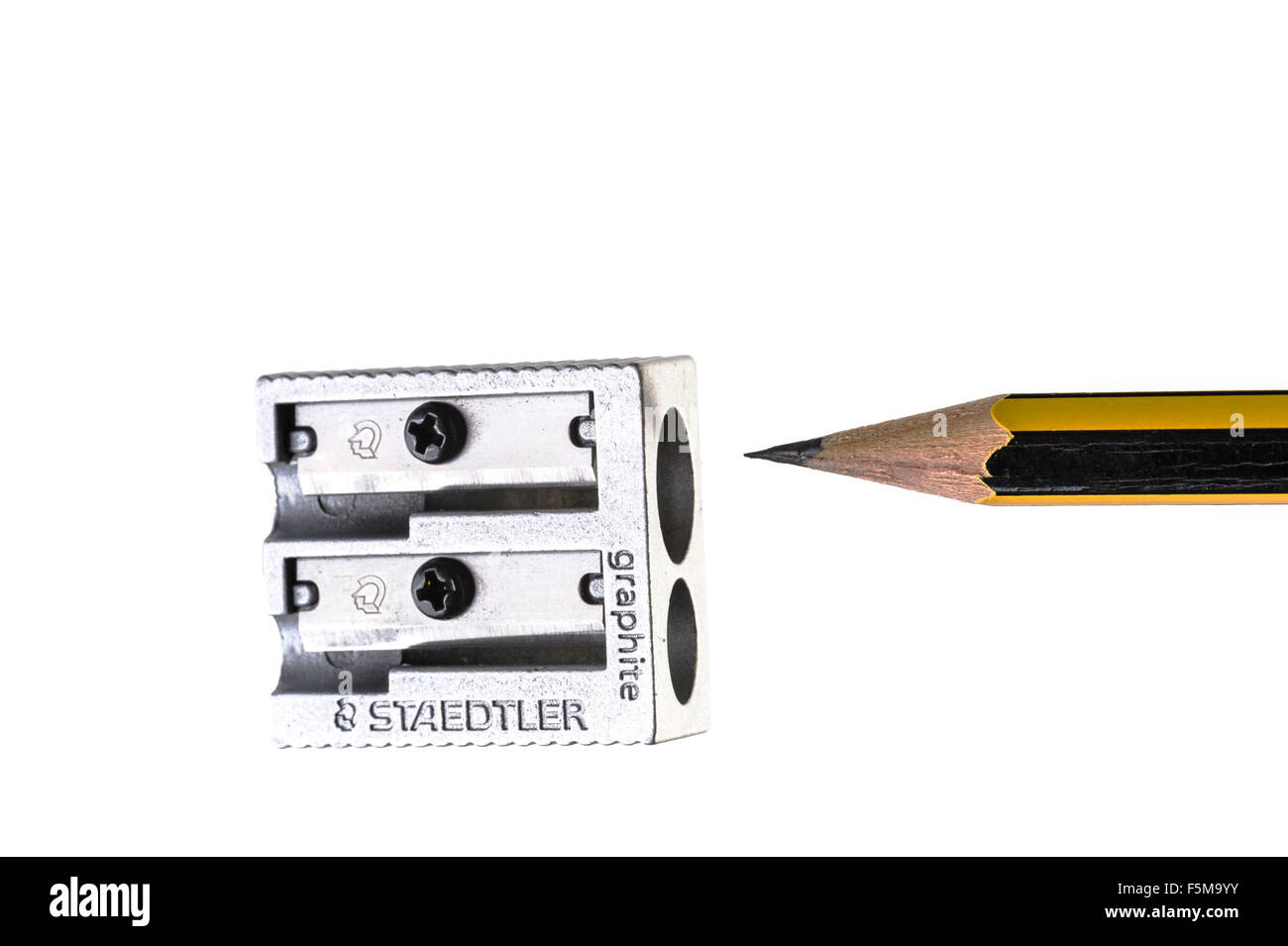 Pencil and metal sharpener Stock Photo - Alamy