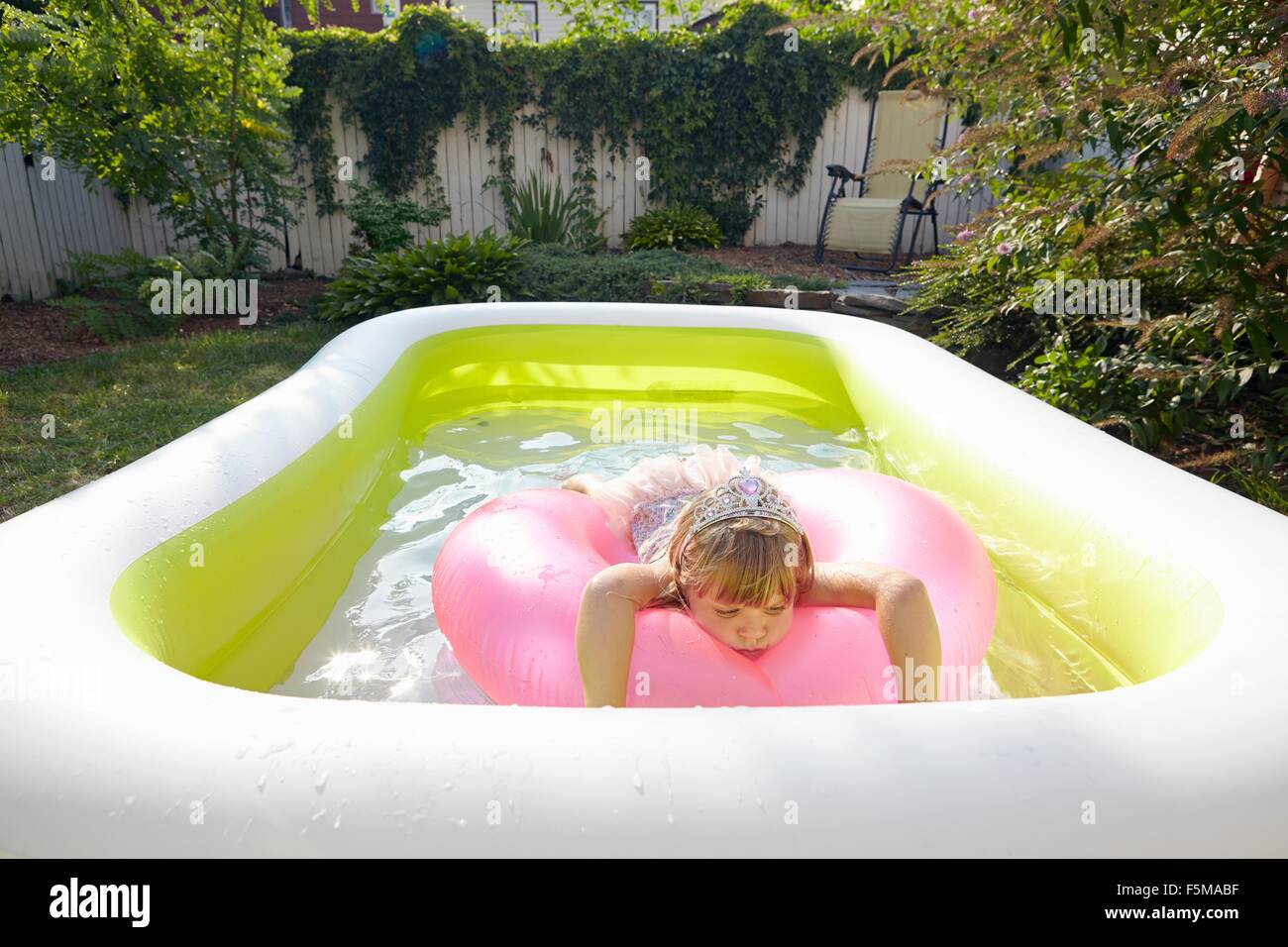 Children on float hi-res stock photography and images - Alamy