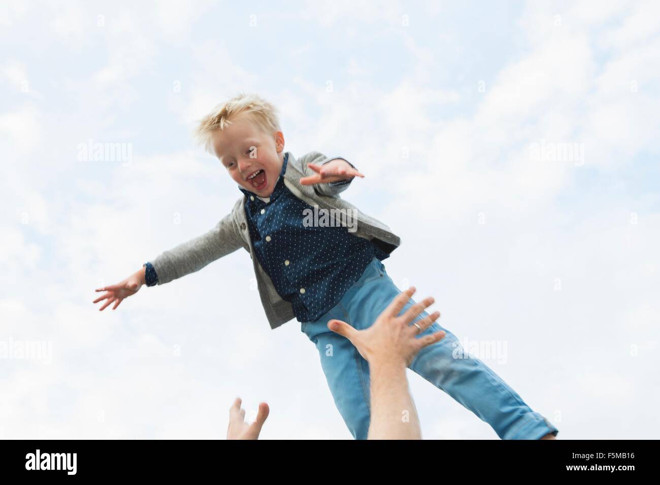 Man throwing child air catching hi-res stock photography and images - Alamy