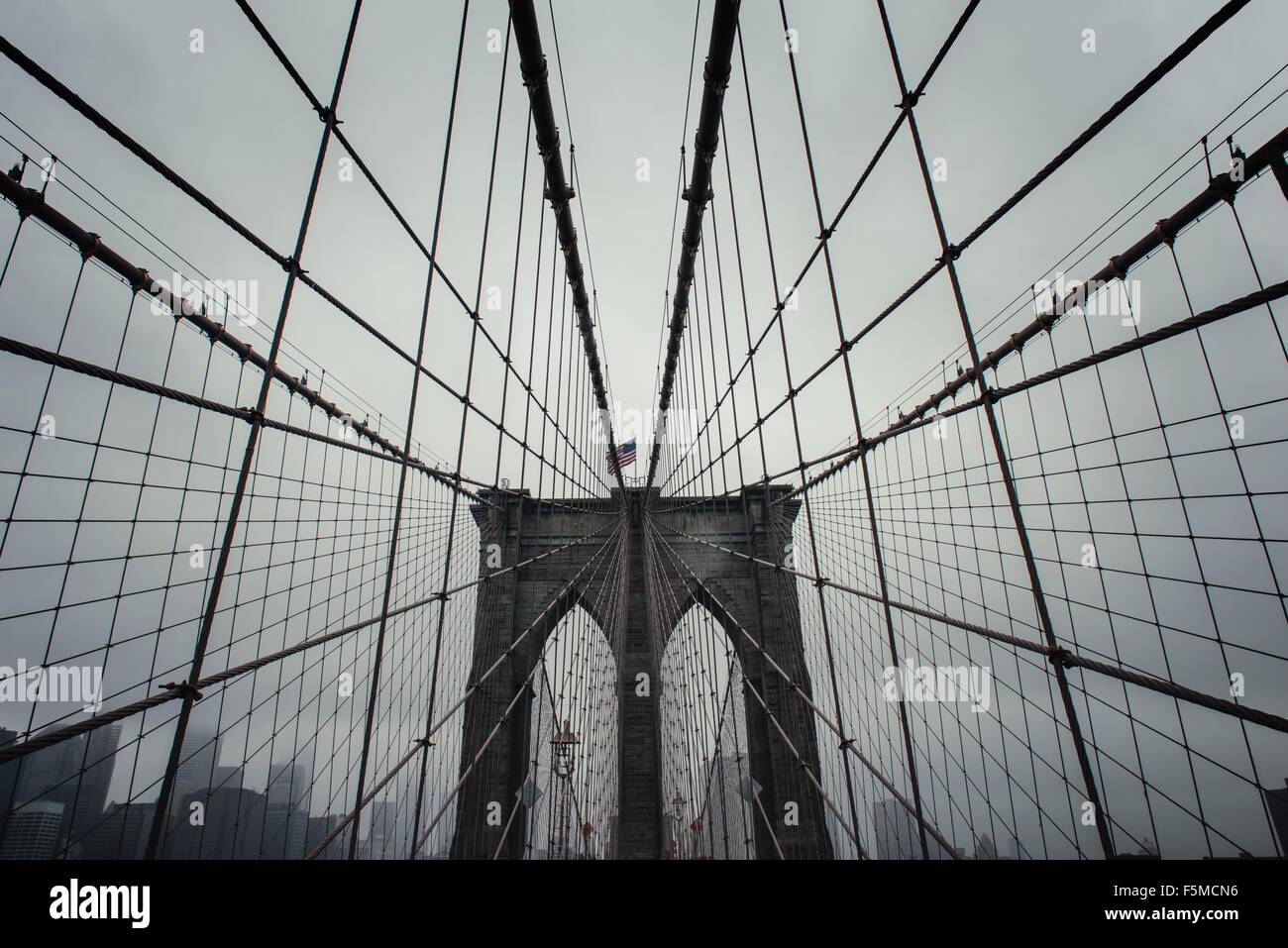 Low angle view of Brooklyn Bridge symmetry, New York, USA Stock Photo ...