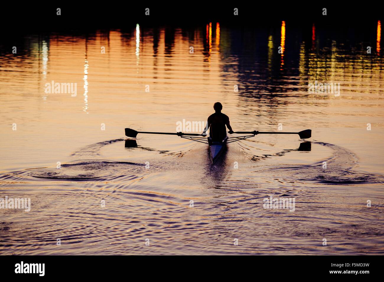 Man rowing hi-res stock photography and images - Alamy