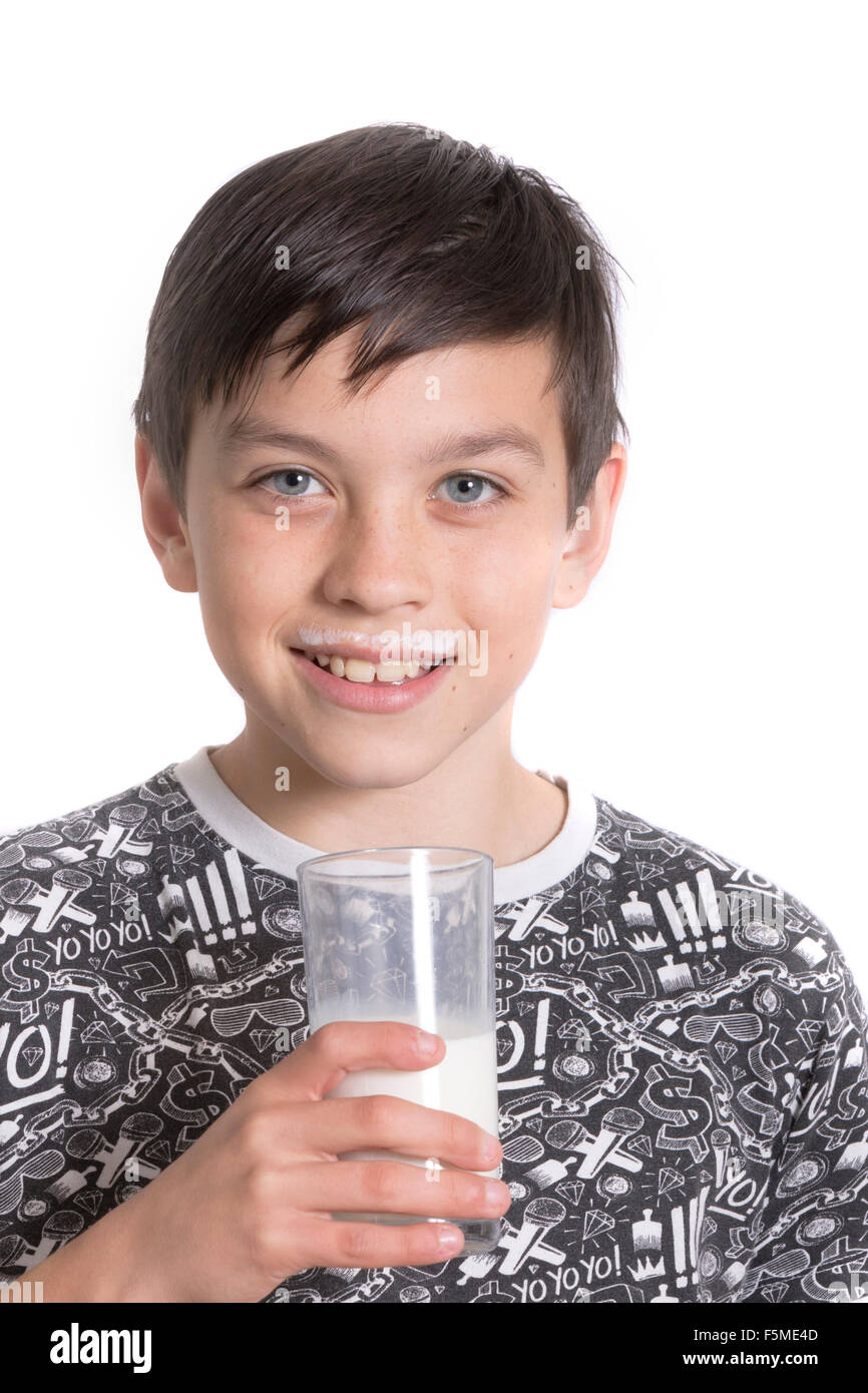 Young boy drinking milk Stock Photo - Alamy