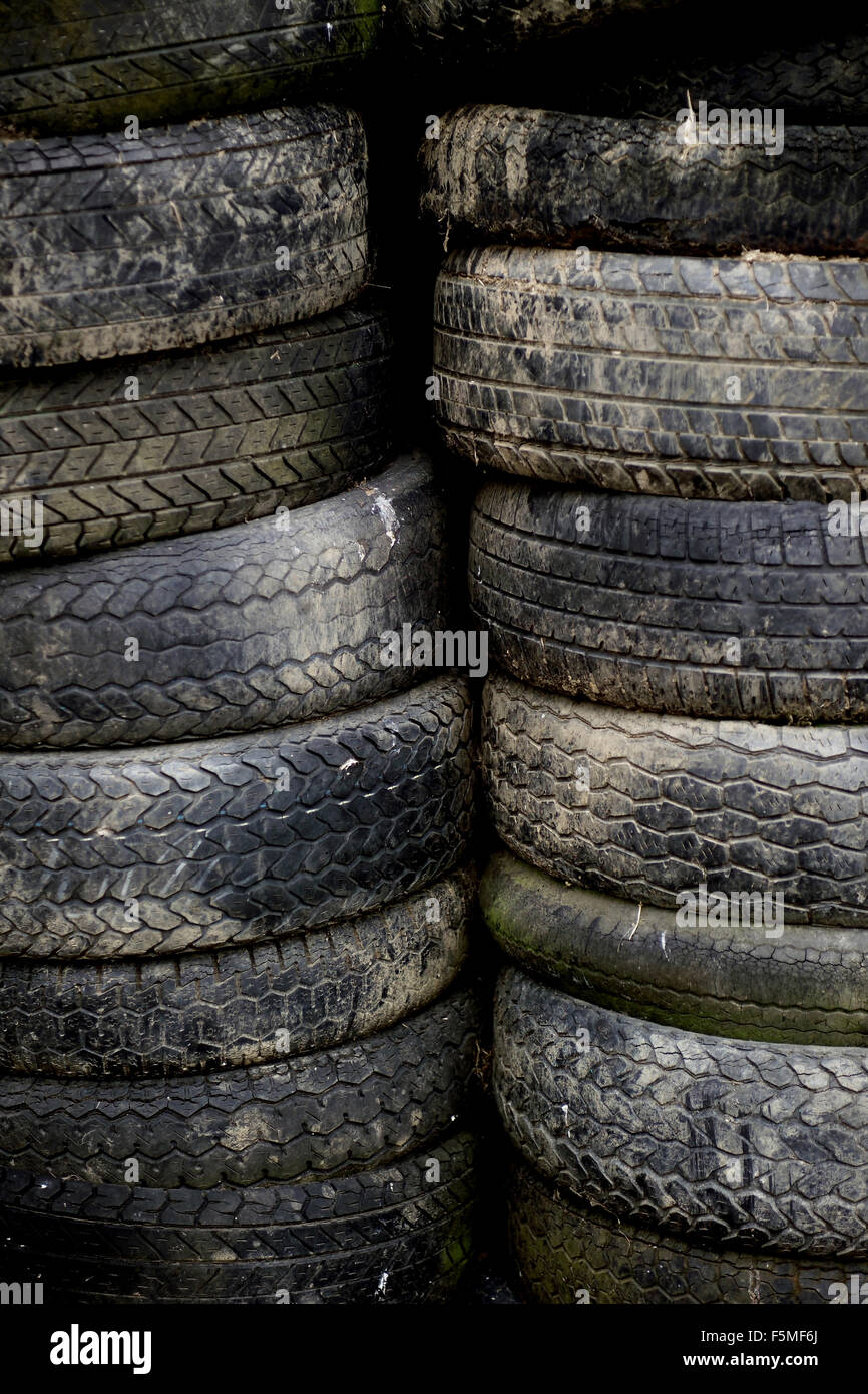 Pile of used tyres Stock Photo - Alamy