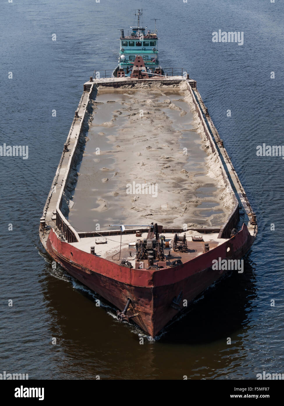 Tug boat towing a barge on the river Stock Photo - Alamy