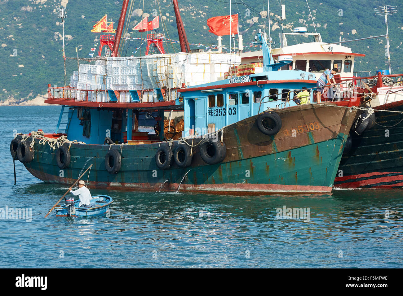 Side profile of a man fishing in a boat hi-res stock photography and ...