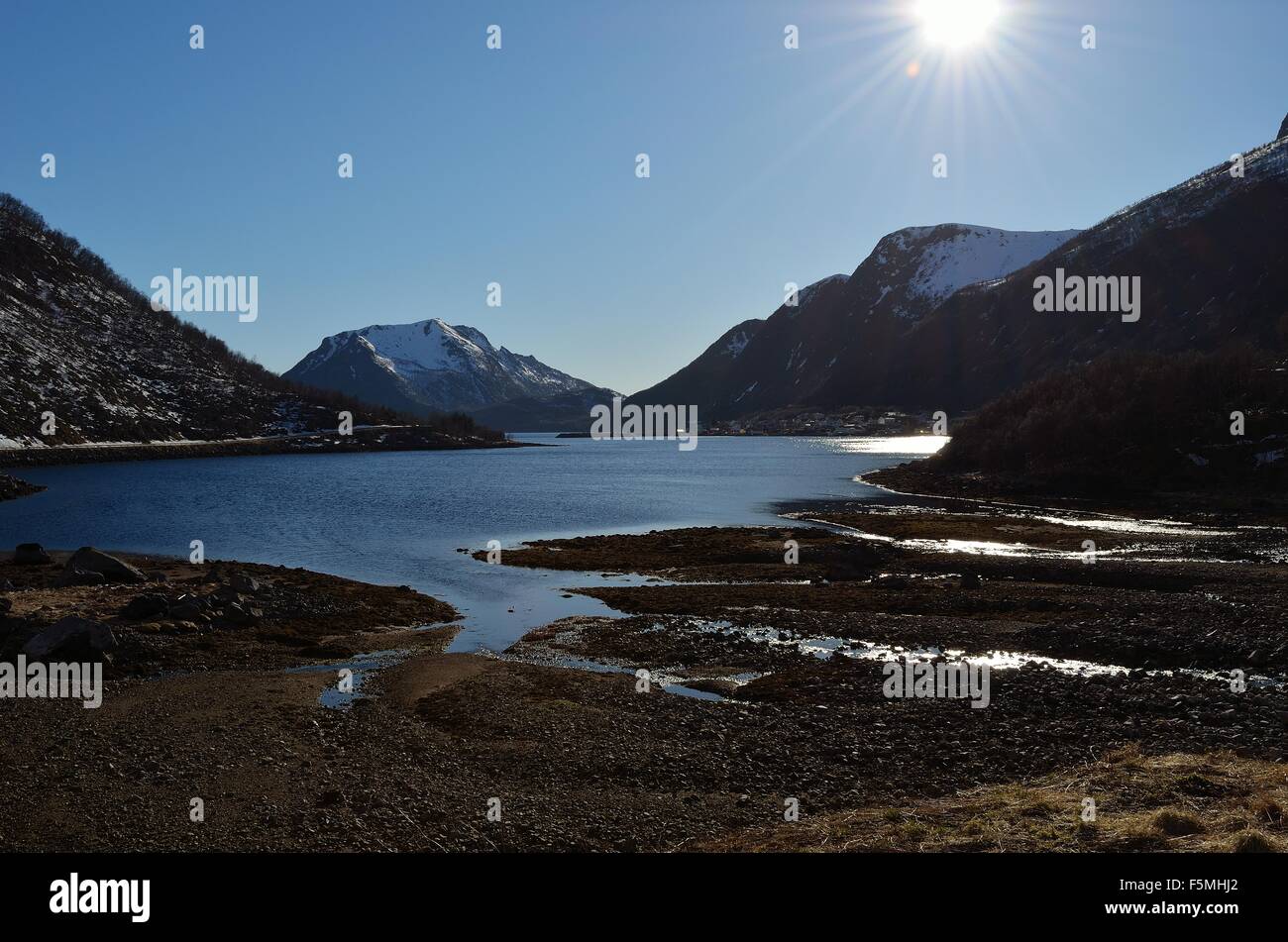 Medby on the island of Senja with high mountains in the background on ...
