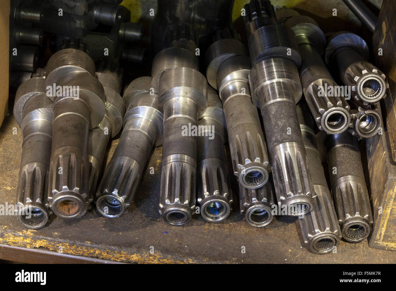 hydraulic engine parts on the work table Stock Photo - Alamy