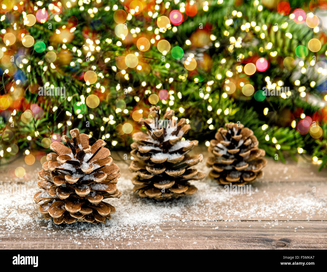 Christmas tree branches. with decorations and color lights. Selective ...