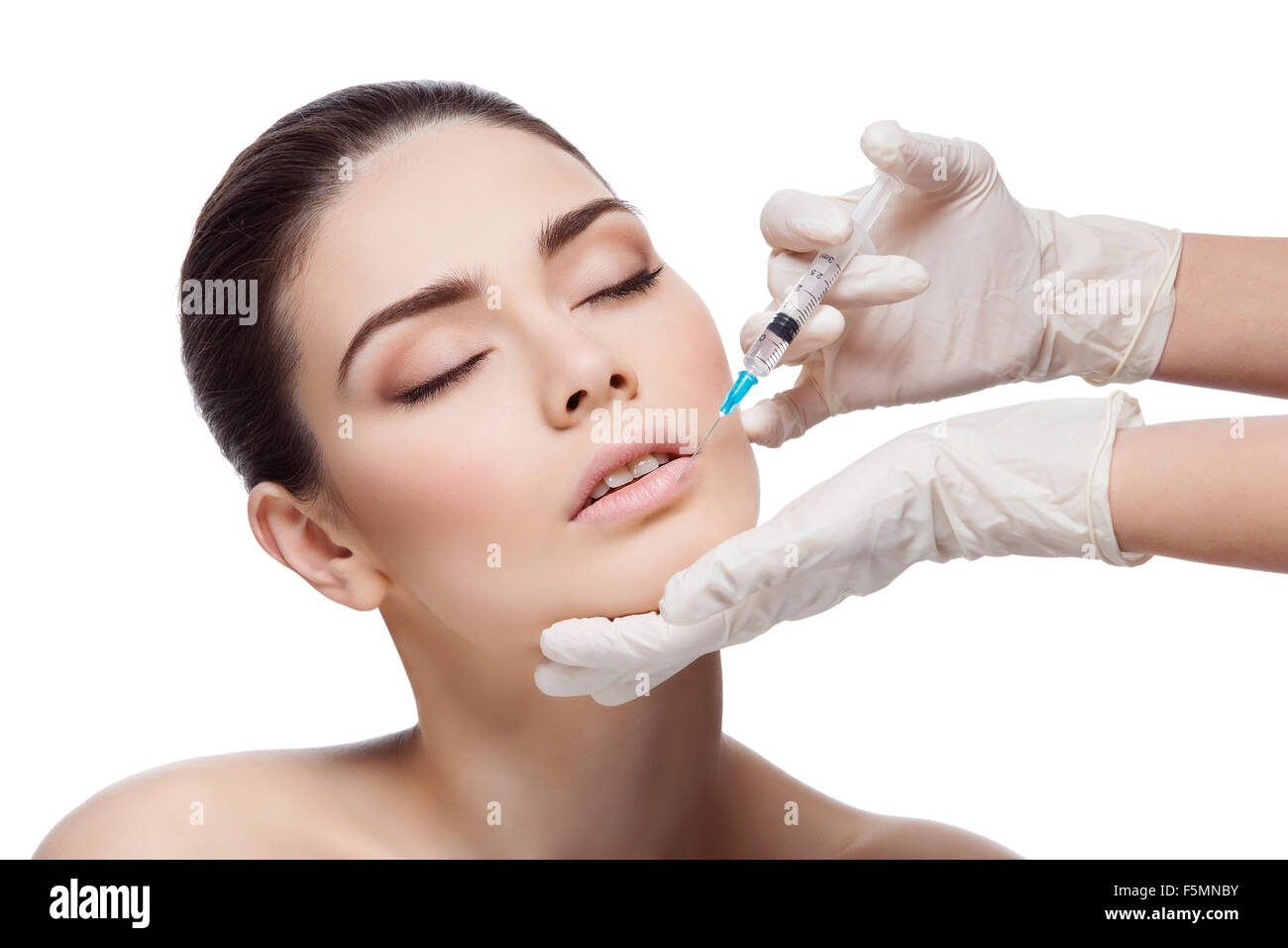 Woman gets collagen injection Stock Photo - Alamy