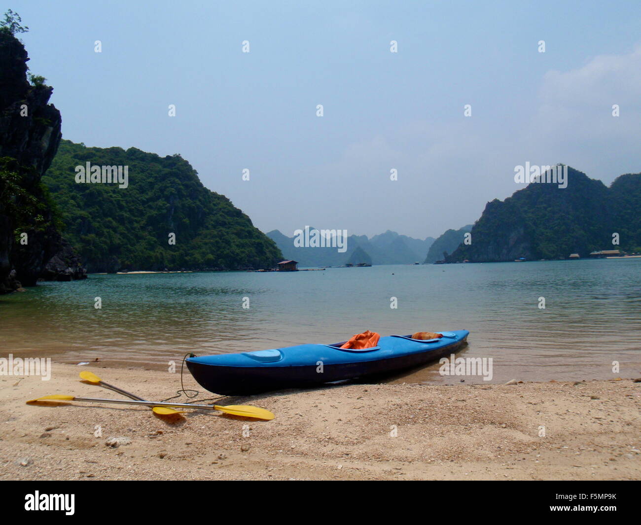 Kayak on the beach at Halong Bay, North Vietnam Stock Photo - Alamy