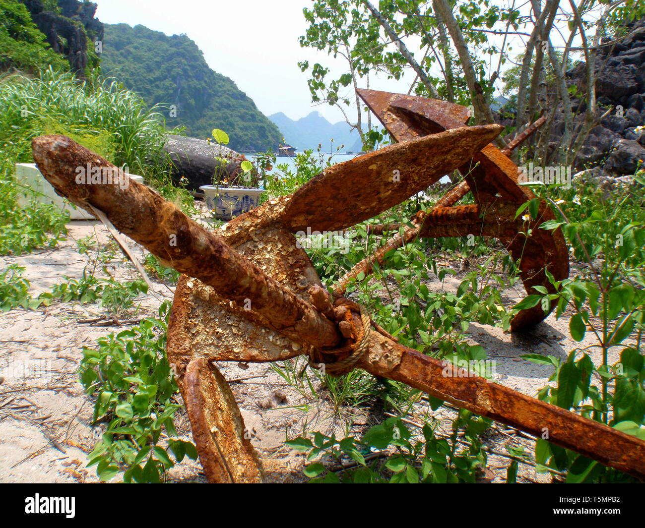Rusting Anchor on the beach at Halong Bay, Vietnam. Unesco World ...