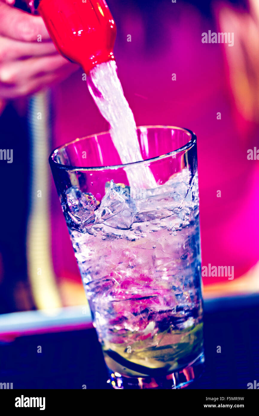Bartender making Front porch cocktail in Italian restaurant Stock Photo ...