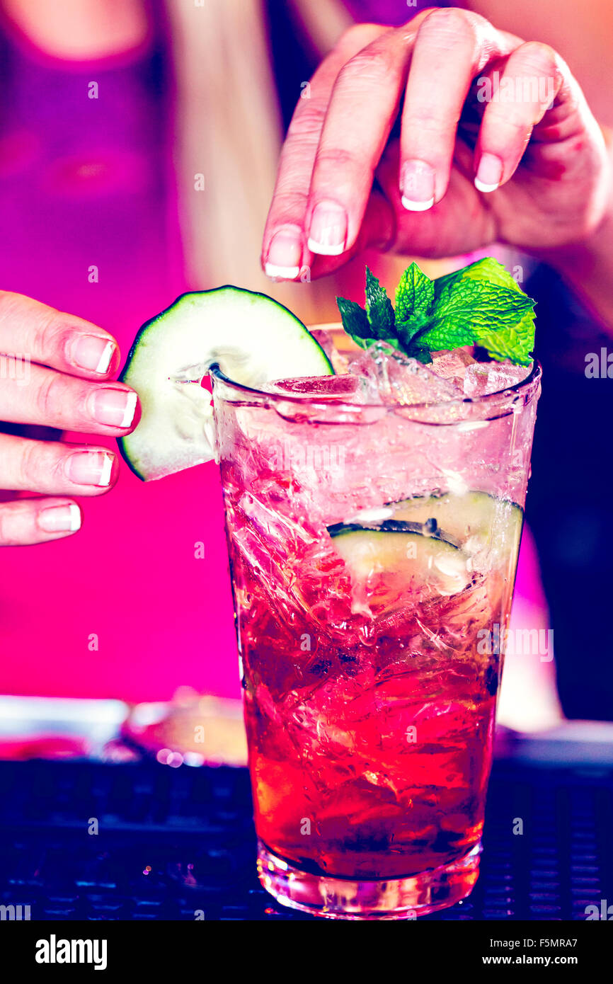 Bartender making Front porch cocktail in Italian restaurant Stock Photo ...