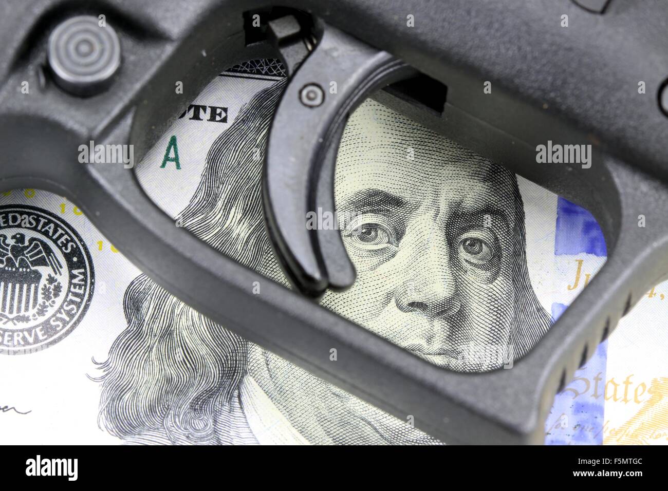 Weapons and Money Stock Photo - Alamy