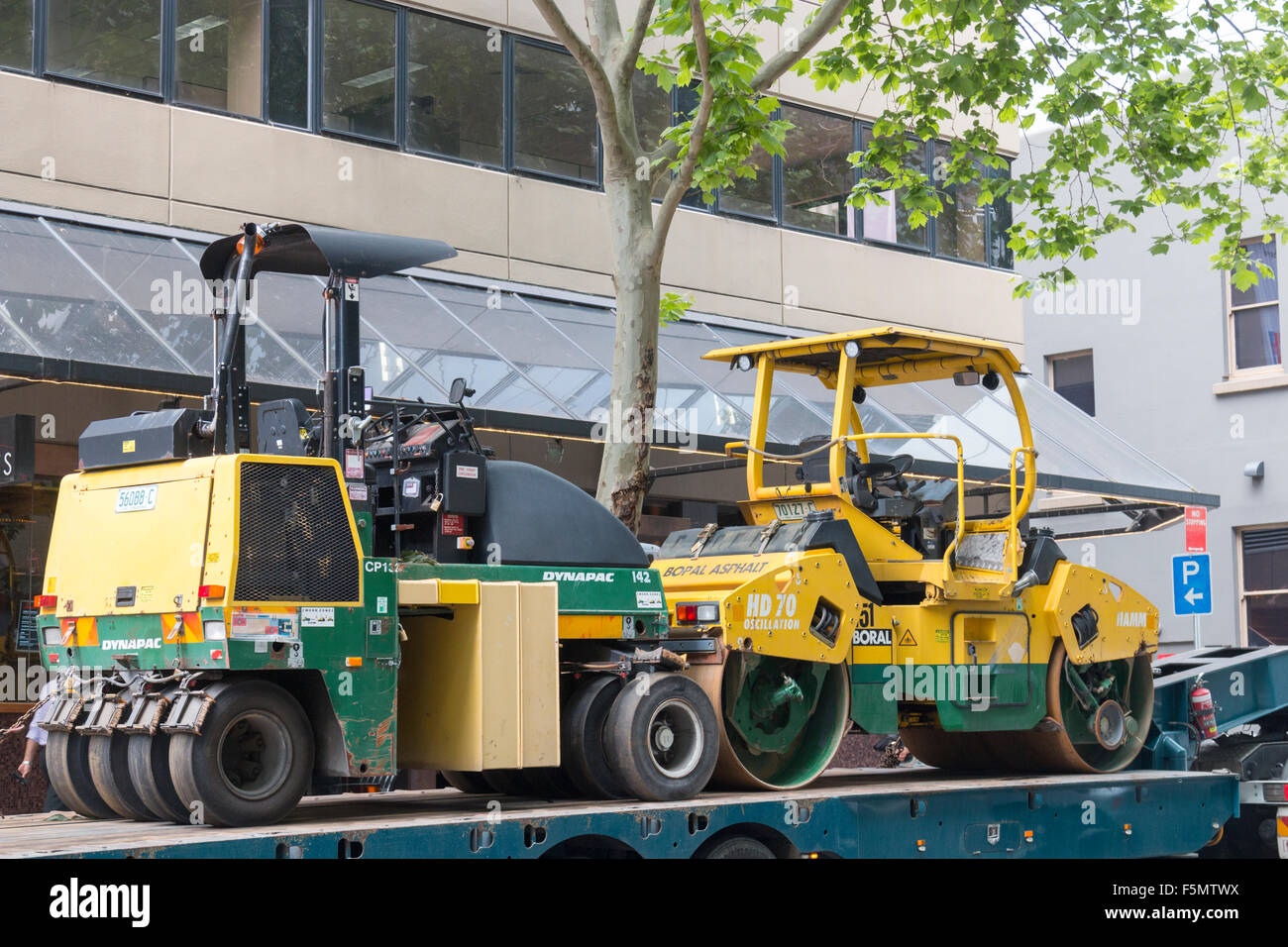 construction building site machinery equipment on the back of a lorry ...