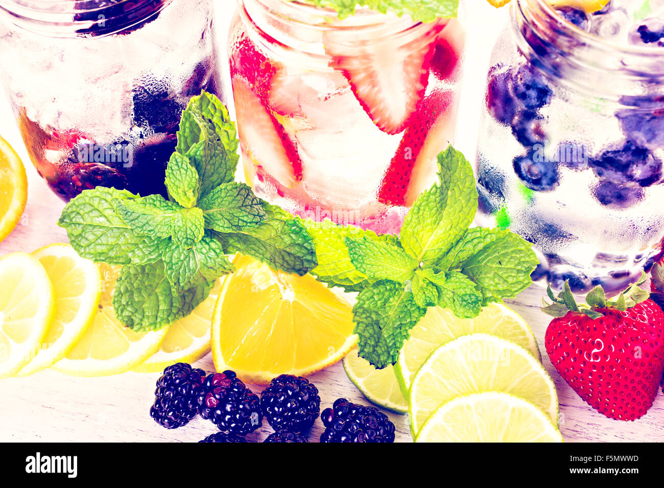 Infused water with fresh organic berries Stock Photo - Alamy