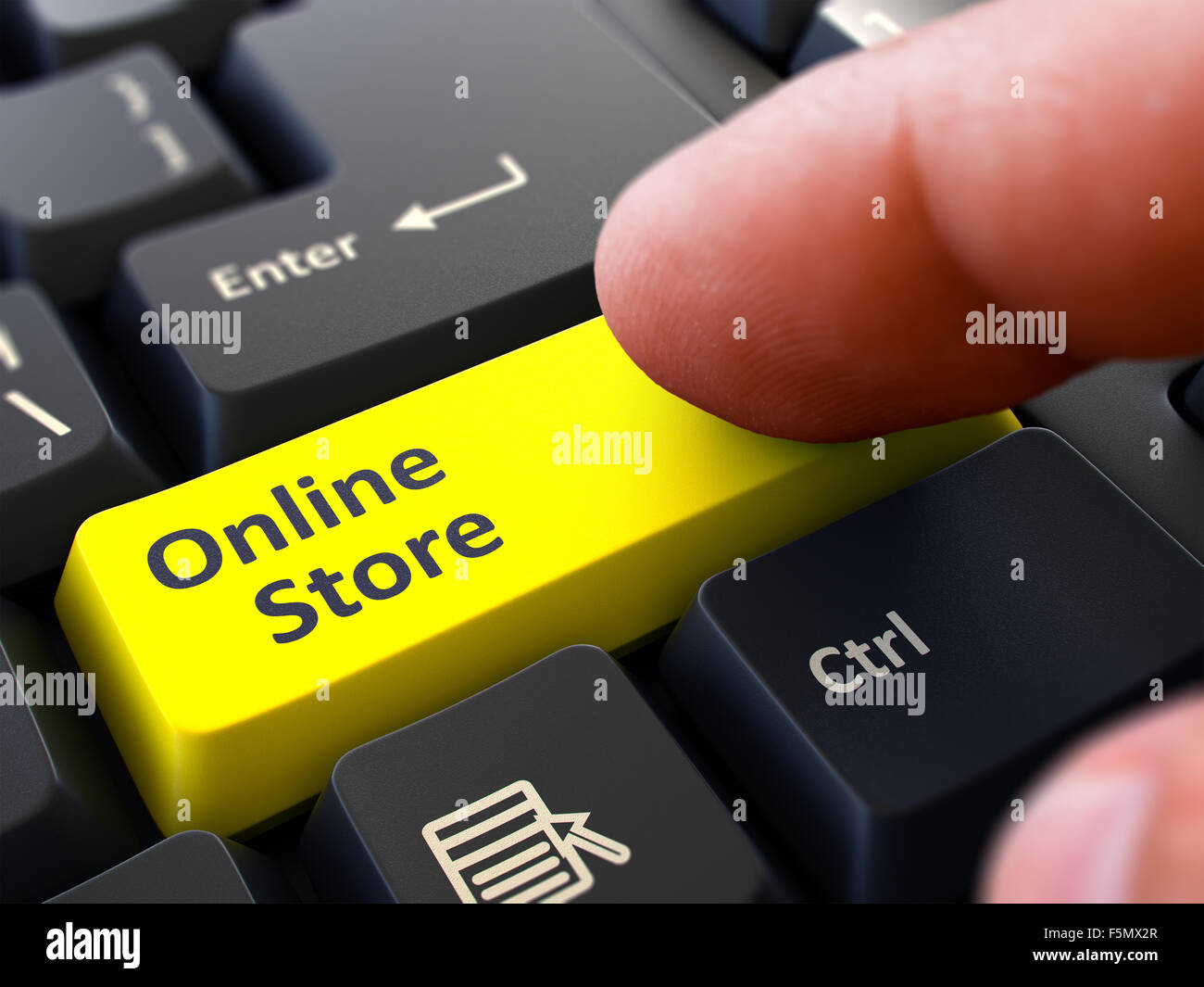Pressing Yellow Button Online Store on Black Keyboard Stock Photo - Alamy