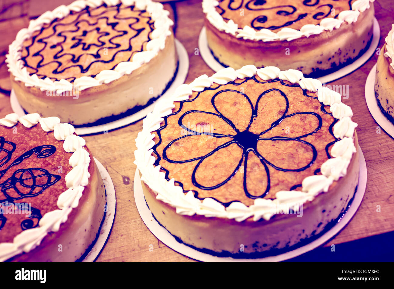 Cheesecakes prepared in the kitchen of Italian restaurant Stock Photo ...