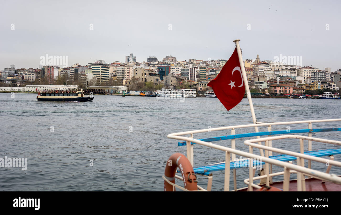 Istanbul coastline from a boat with the turkish flag Stock Photo - Alamy