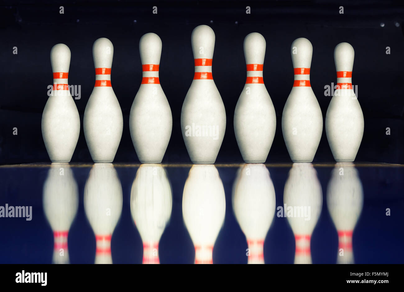 Bowling pins on an alley Stock Photo - Alamy