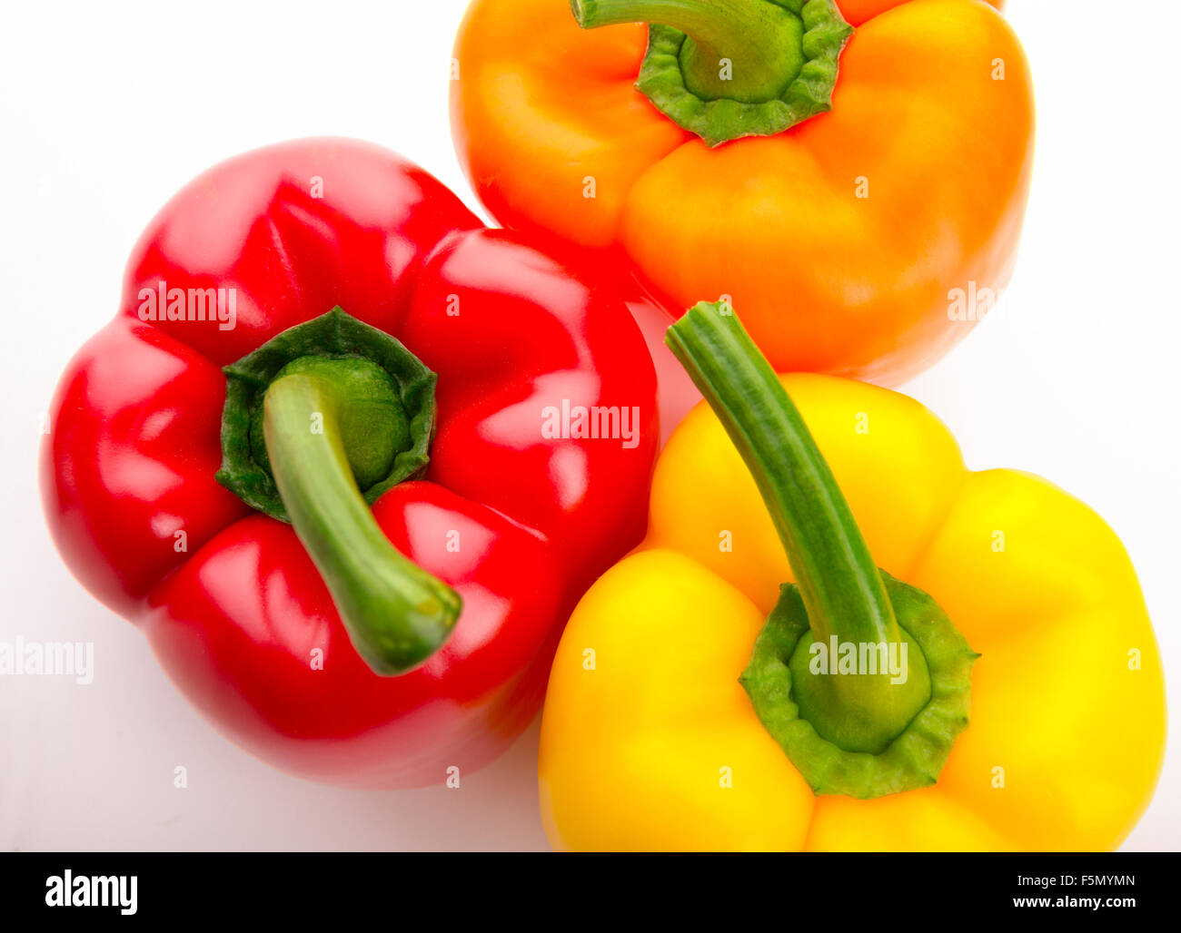Three different Peppers. Isolated over white. Fresh vegetables Stock ...