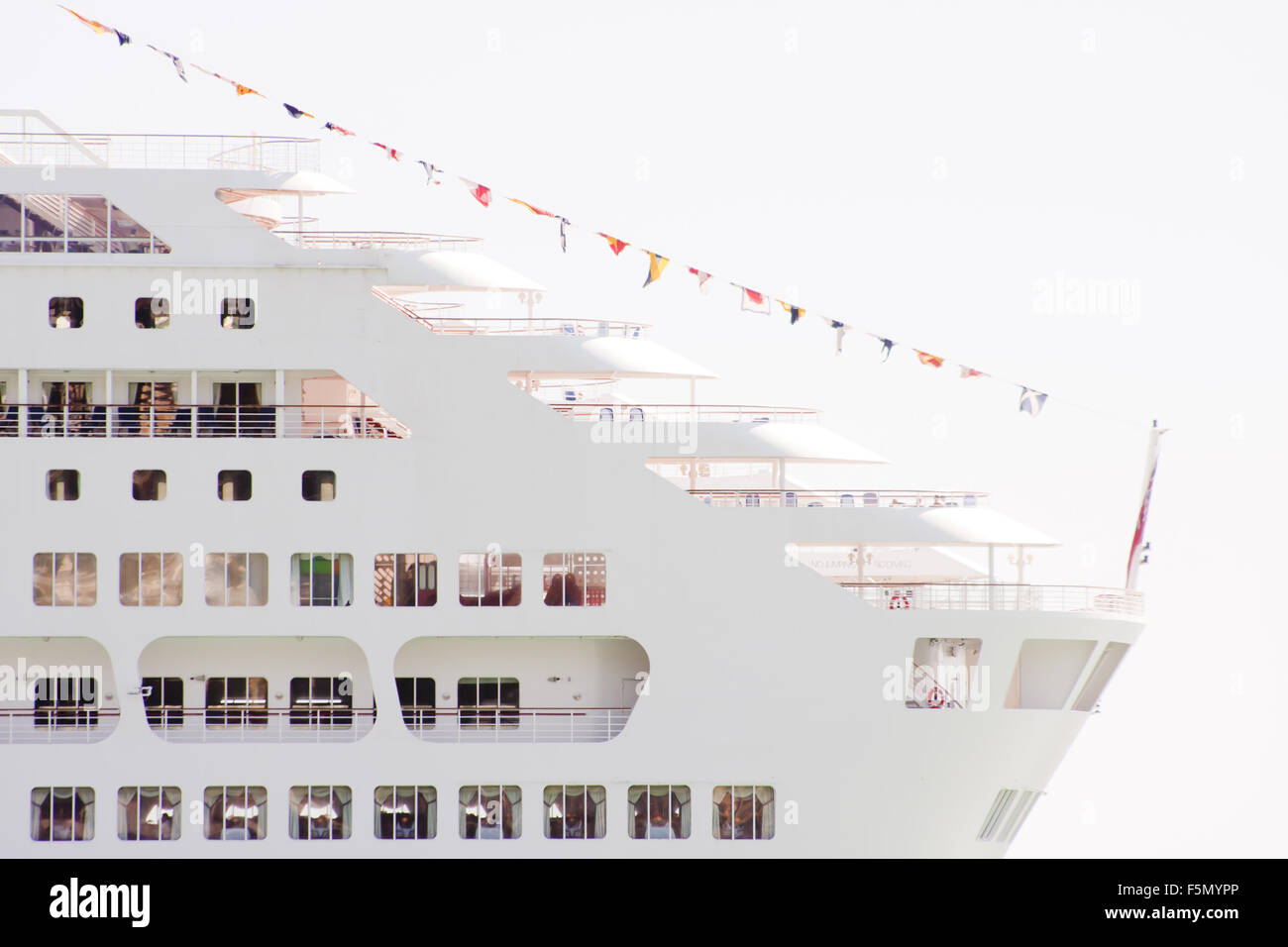 Cruise ship decks and flags Stock Photo - Alamy