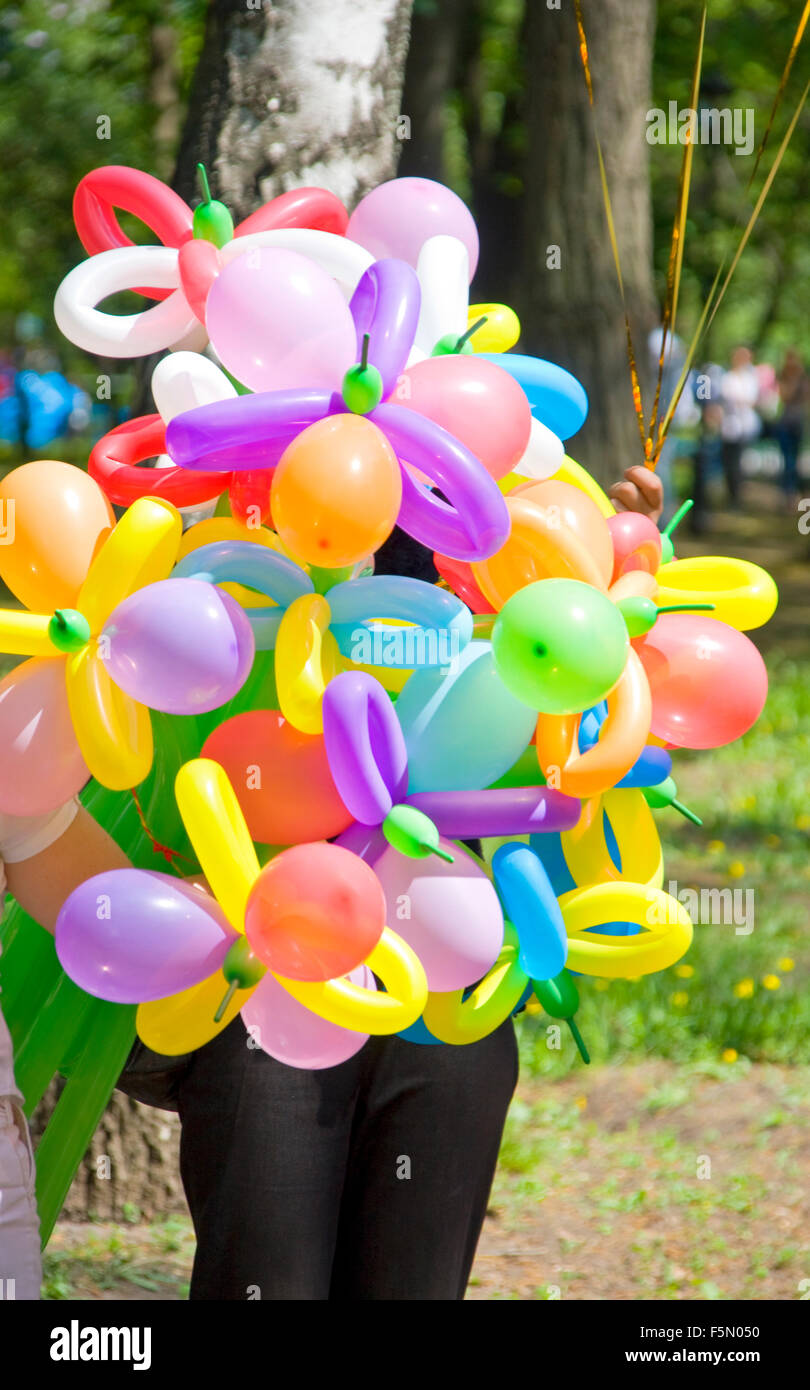 Balloon seller in park Stock Photo - Alamy