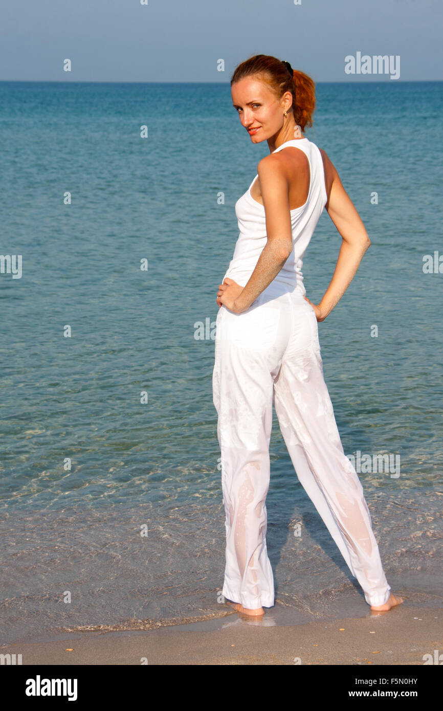 Tan summer adult beach hi-res stock photography and images - Alamy