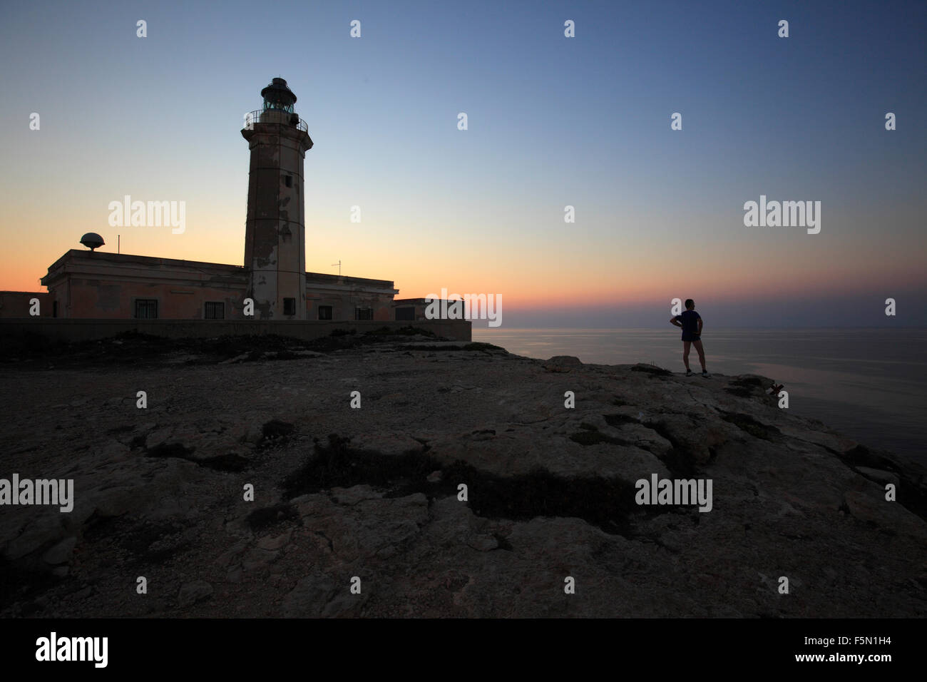 Lampedusa lighthouse at sunset, Sicily, Italy Stock Photo - Alamy