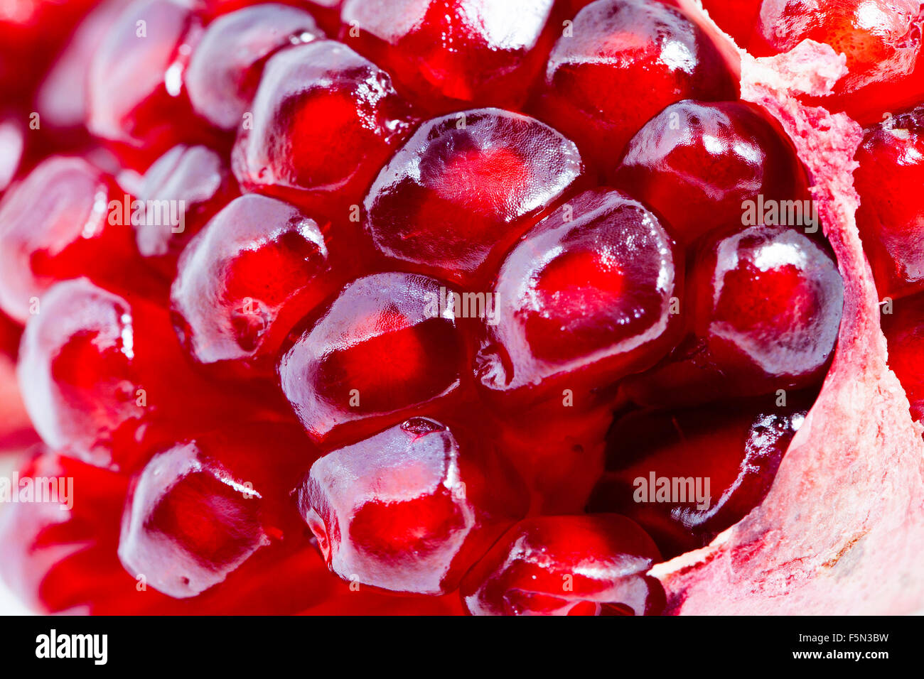 ripe red pomegranate Stock Photo - Alamy