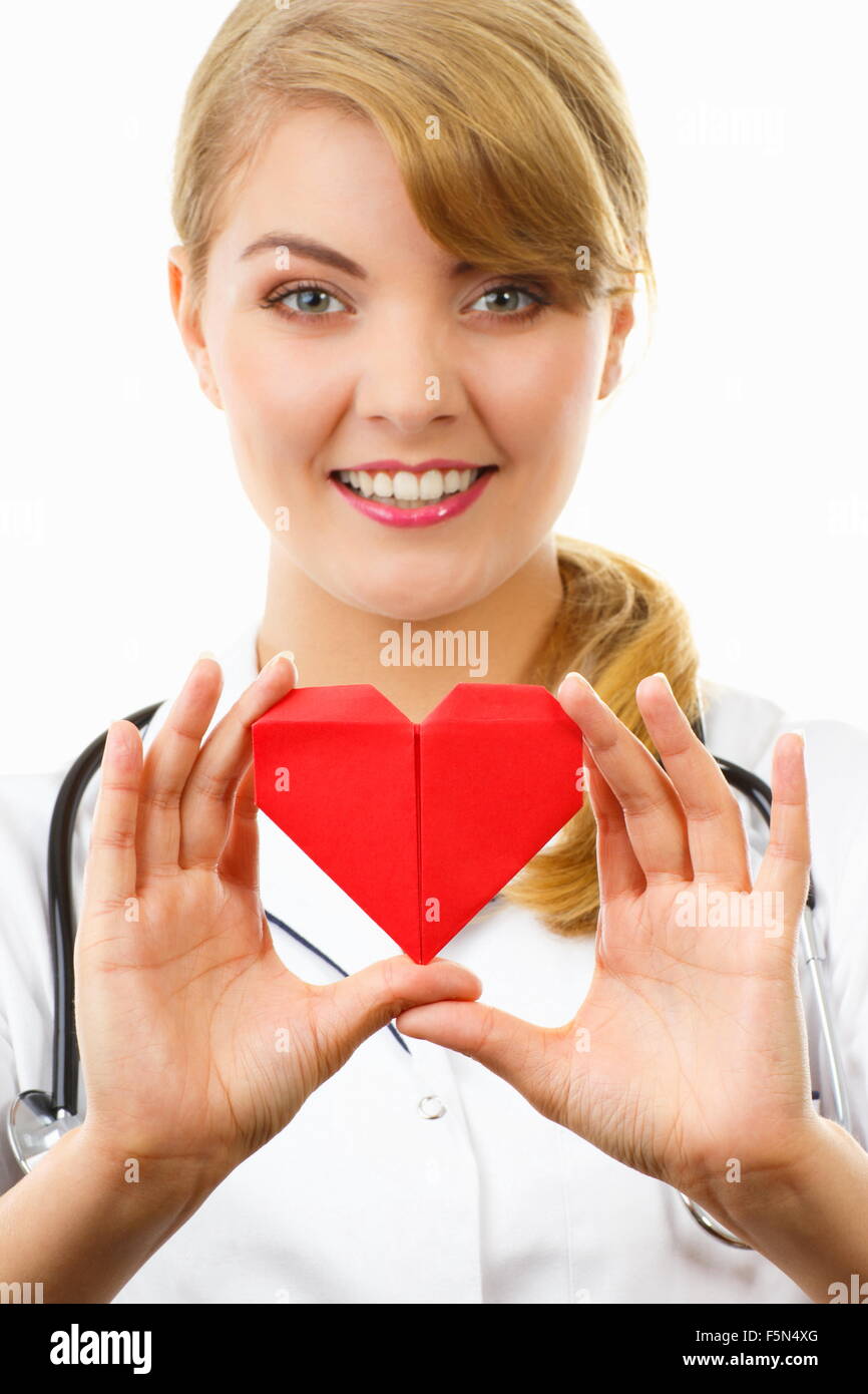 Smiling Woman Doctor Cardiologist In White Apron With Stethoscope