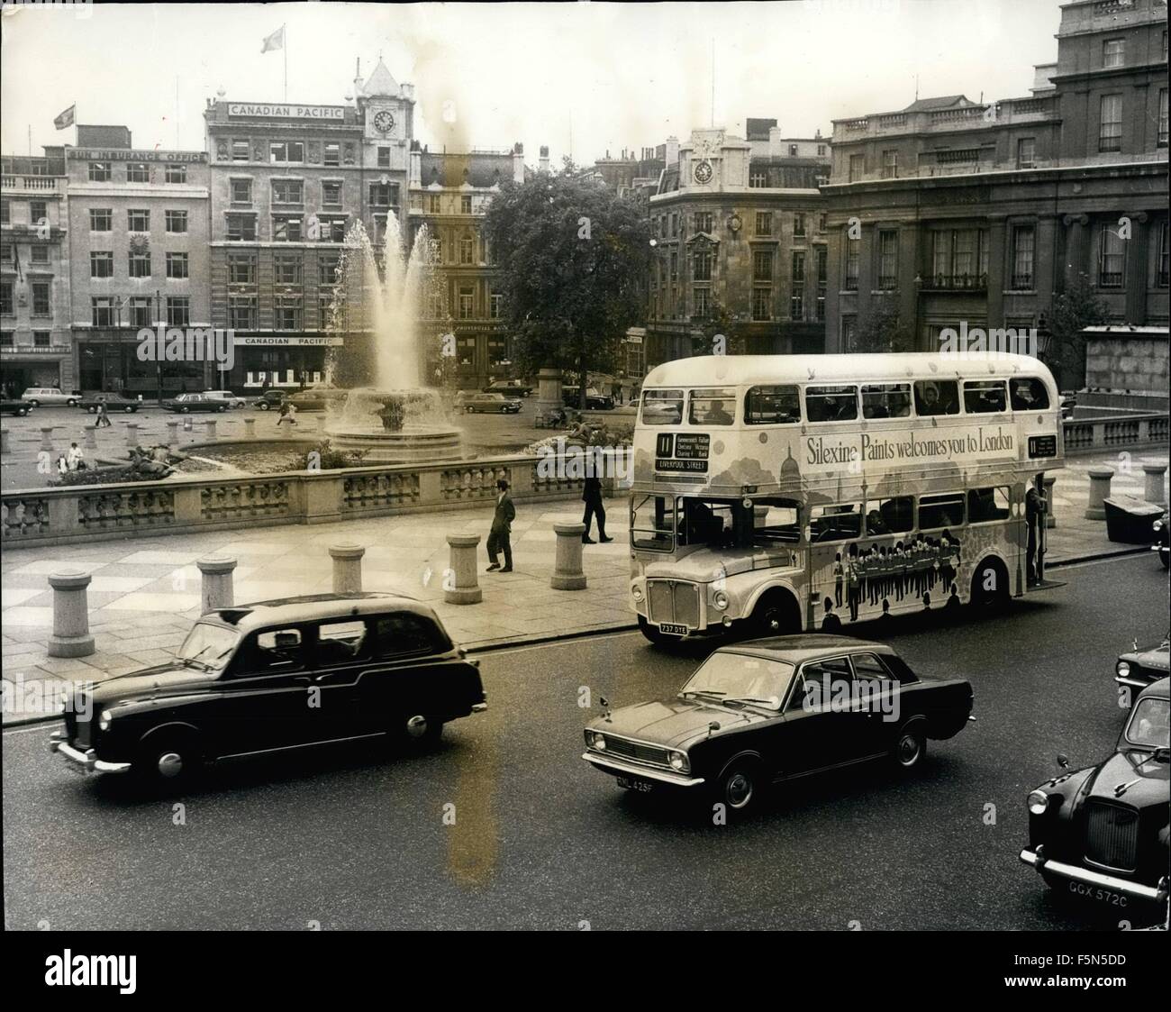 1962 - Photo shows View of the colourful bus during today's launch trip ...