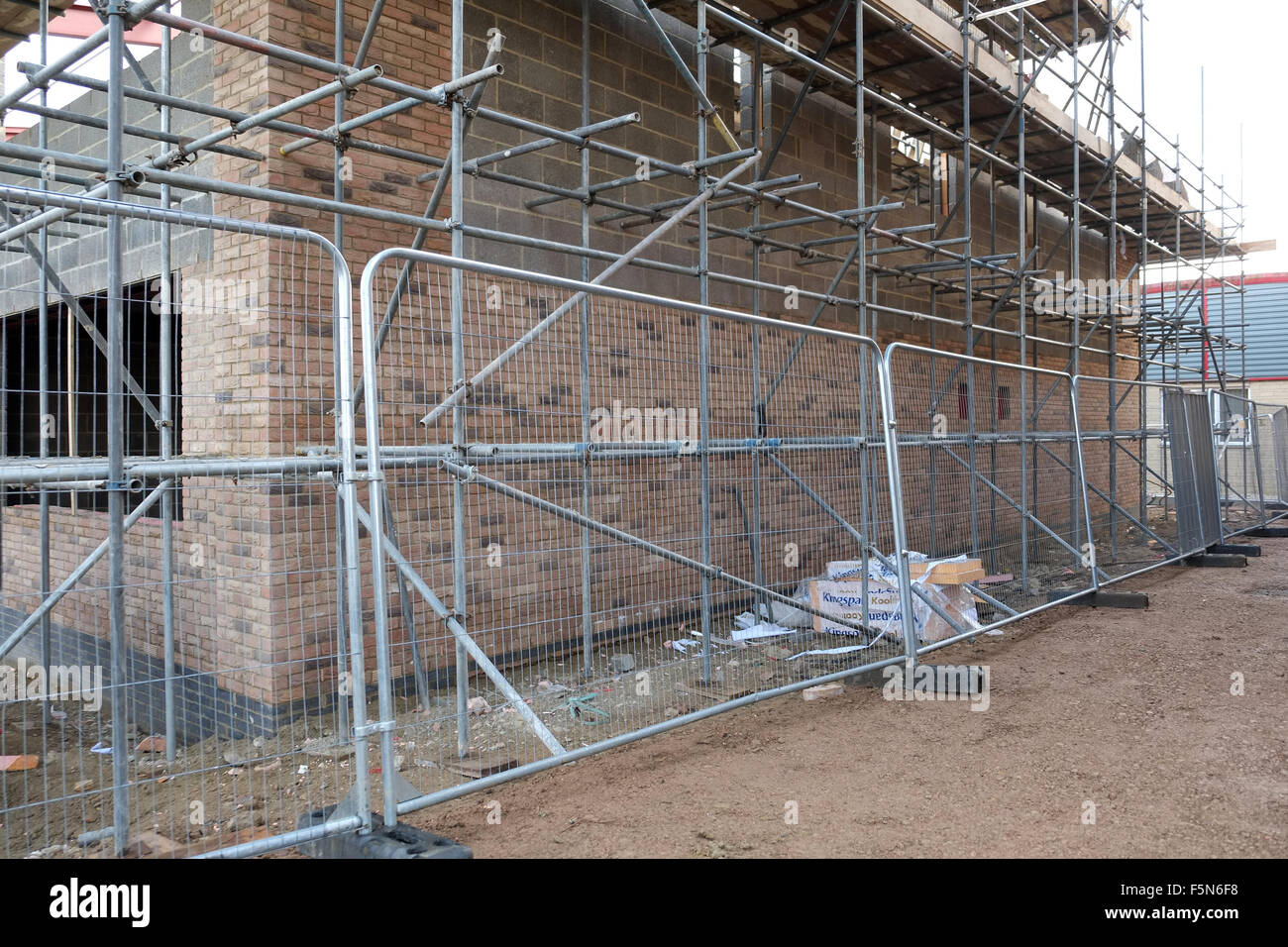 Security fencing on a British Construction site Stock Photo - Alamy