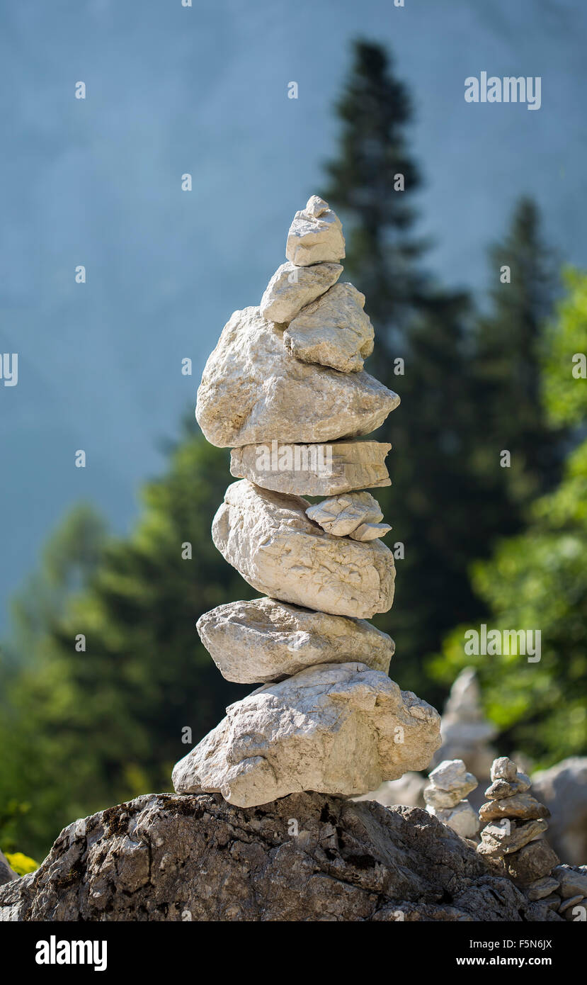 Stacked rock tower in nature, man made Stock Photo - Alamy