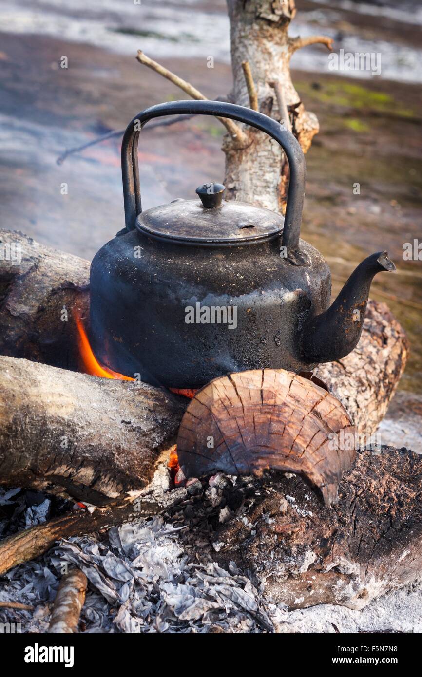 Black kettle hanging over fire hi-res stock photography and images - Alamy