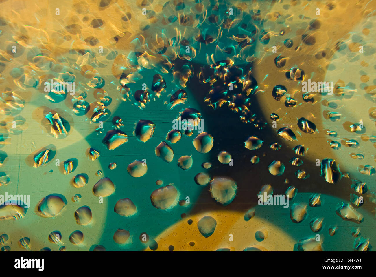 Abstract and psychedelic color background with water drops Stock Photo ...