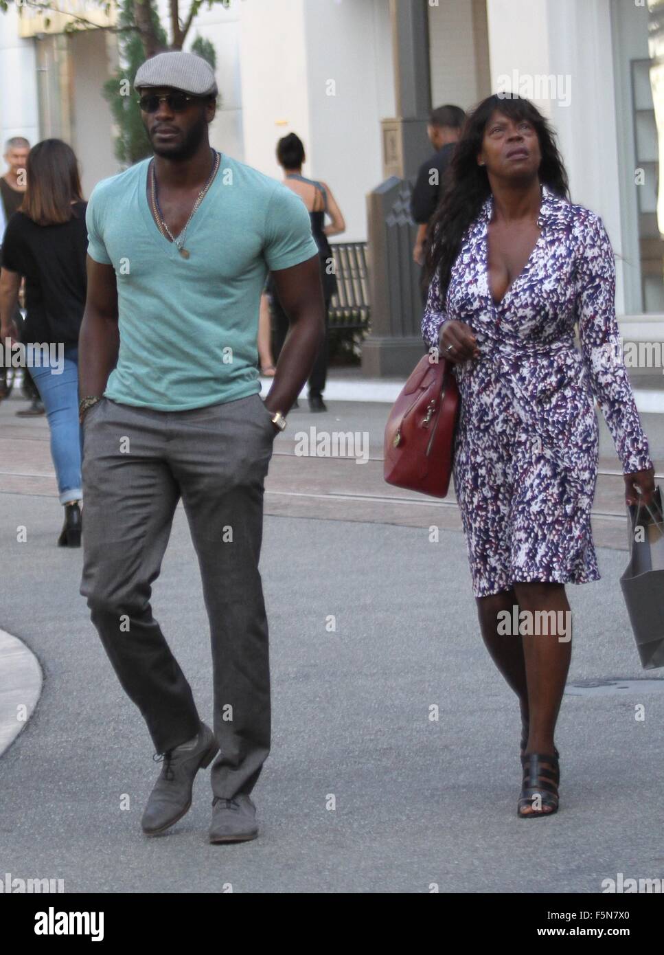 Aldis Hodge out shopping with his mother at The Grove in Hollywood ...