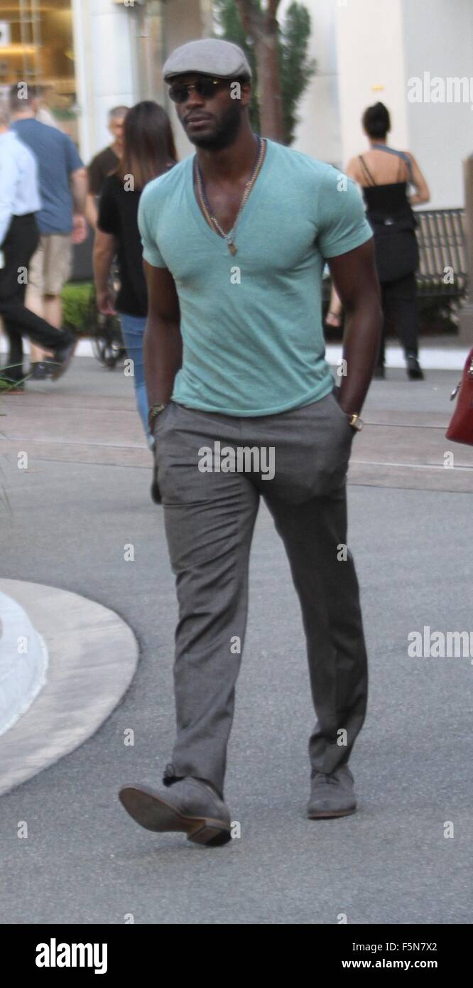 Aldis Hodge out shopping with his mother at The Grove in Hollywood ...